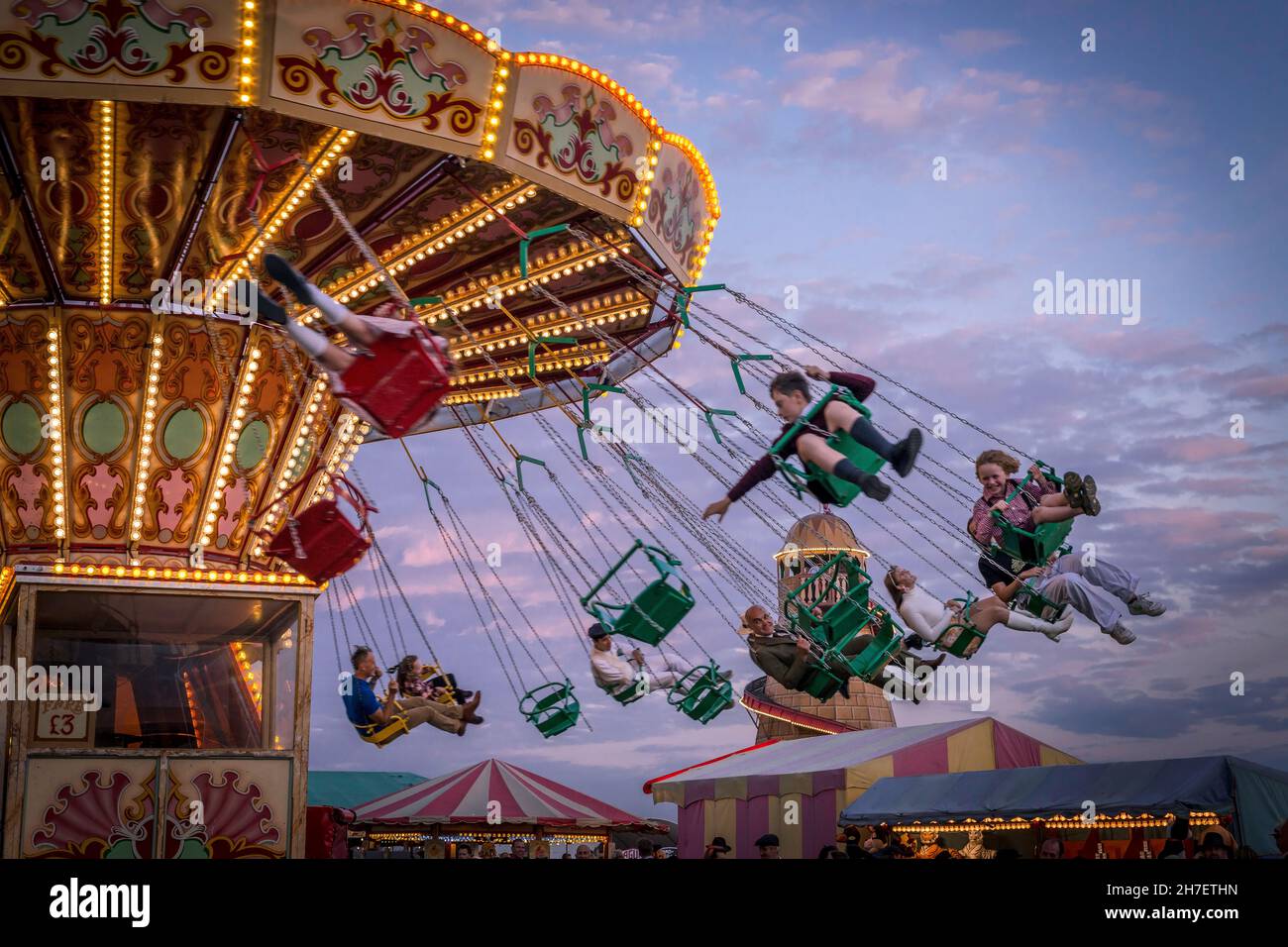 Flying Chairs Fairground Ride, Summer Funfair Stock Photo - Alamy