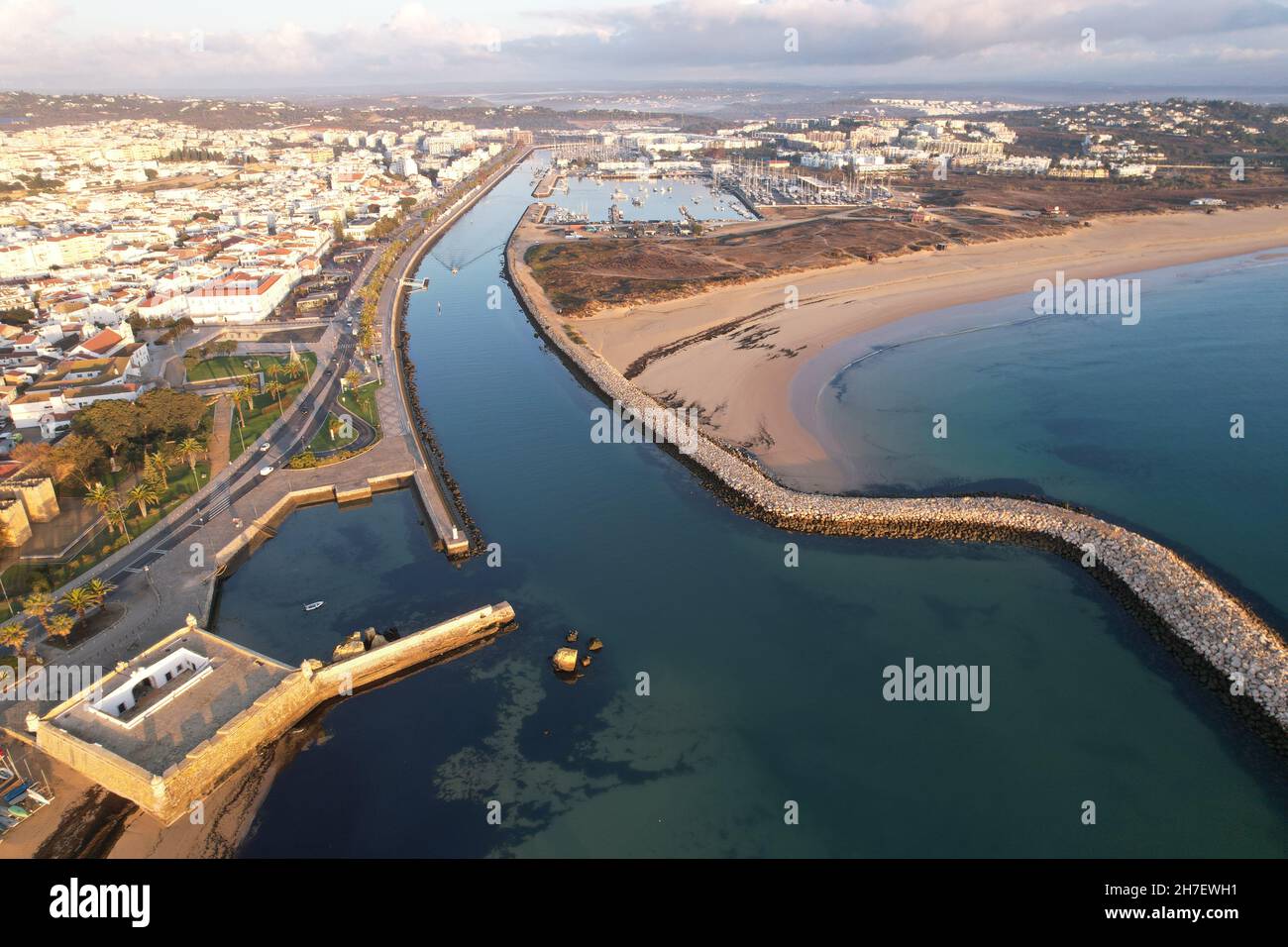 Aerial from the city Lagos in the Algarve Portugal at sunrise marina ...