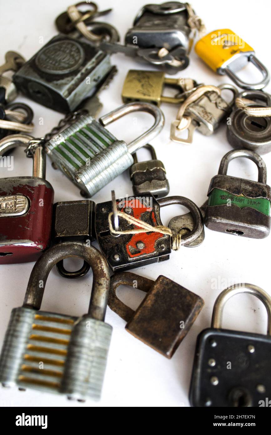 Old keys and locks isolated on a white background Stock Photo - Alamy