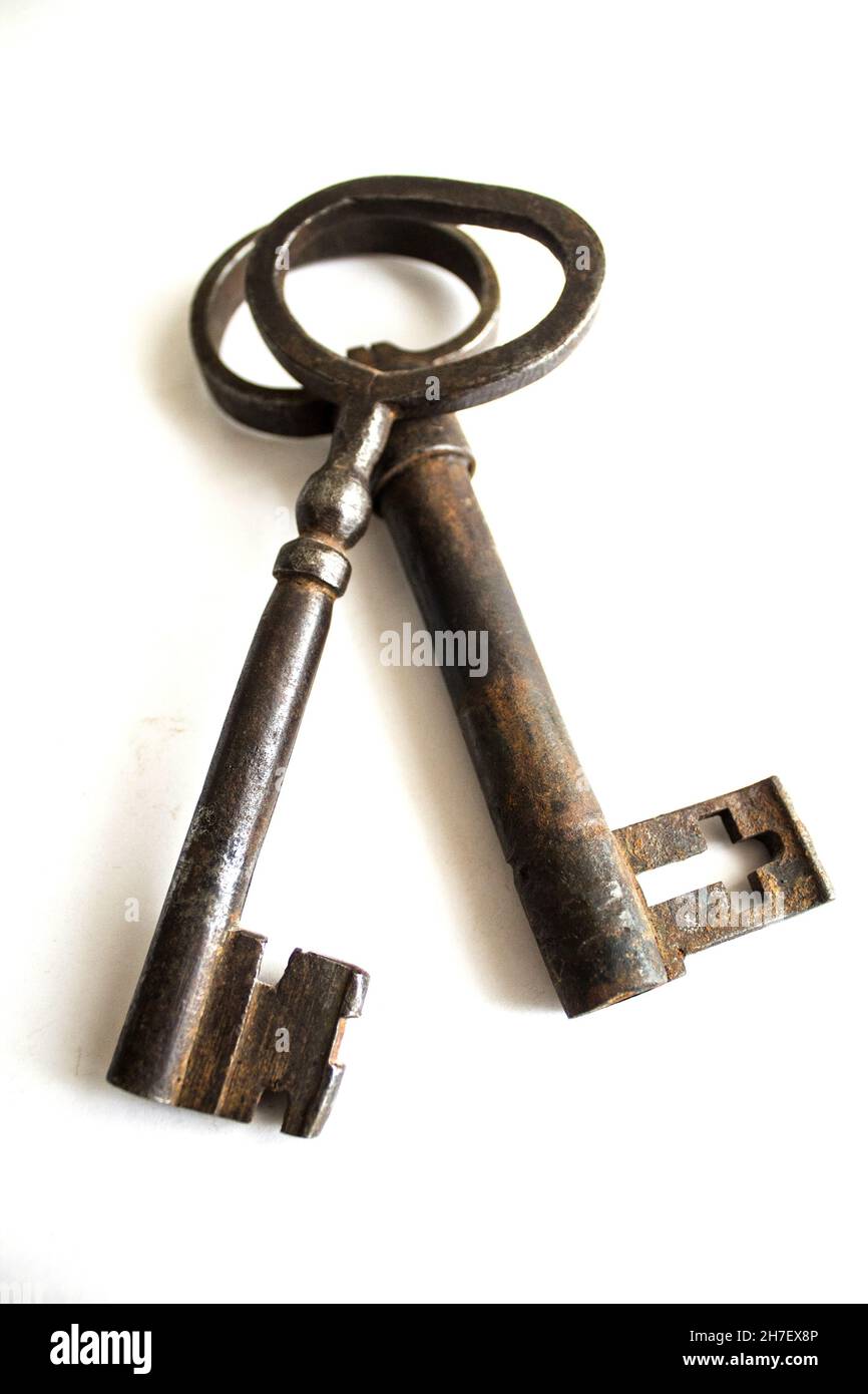 Old vintage keys isolated on a white background Stock Photo - Alamy