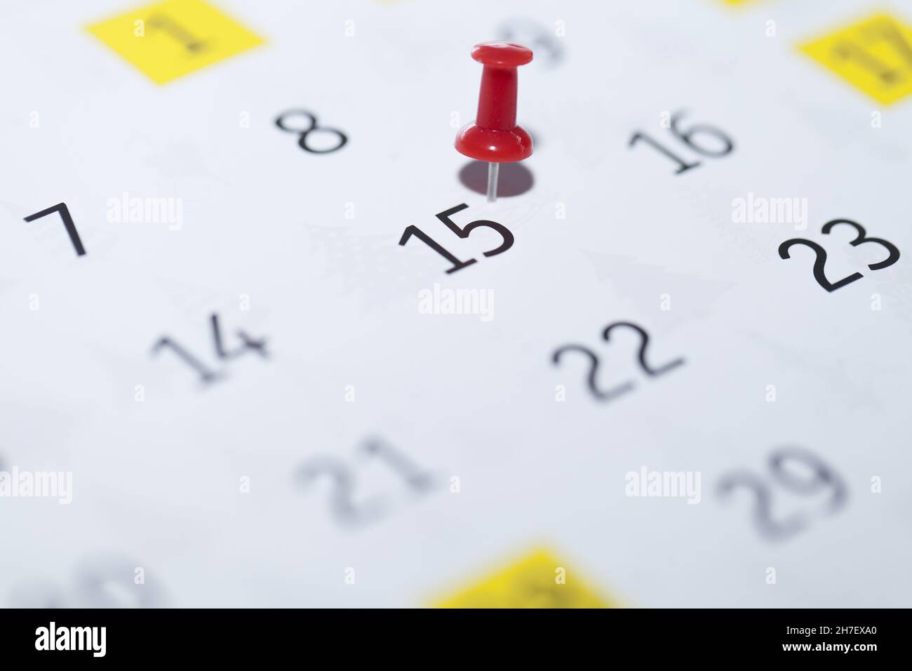 Red pin fixed on the 15th day of a month on a calendar Stock Photo - Alamy