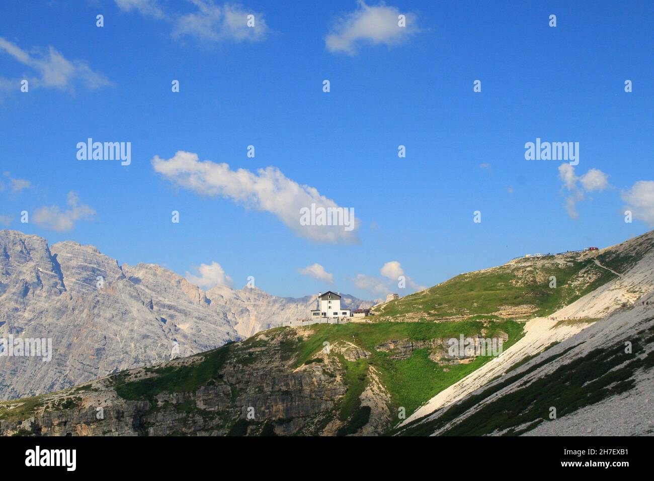Dolomites mountain landscape with building in the distance in the ...