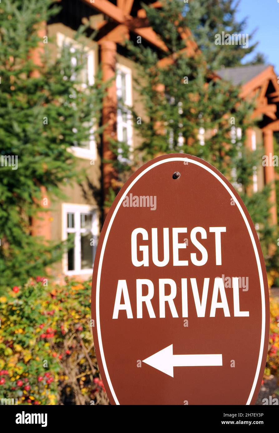 Vertical shot of a guest arrival sign outdoors Stock Photo - Alamy