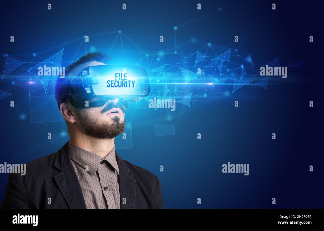 Businessman looking through Virtual Reality glasses, virtual security ...