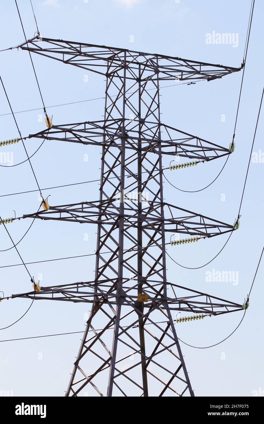 High Voltage Overhead Electrical Grid Power Pylon Stock Photo - Alamy