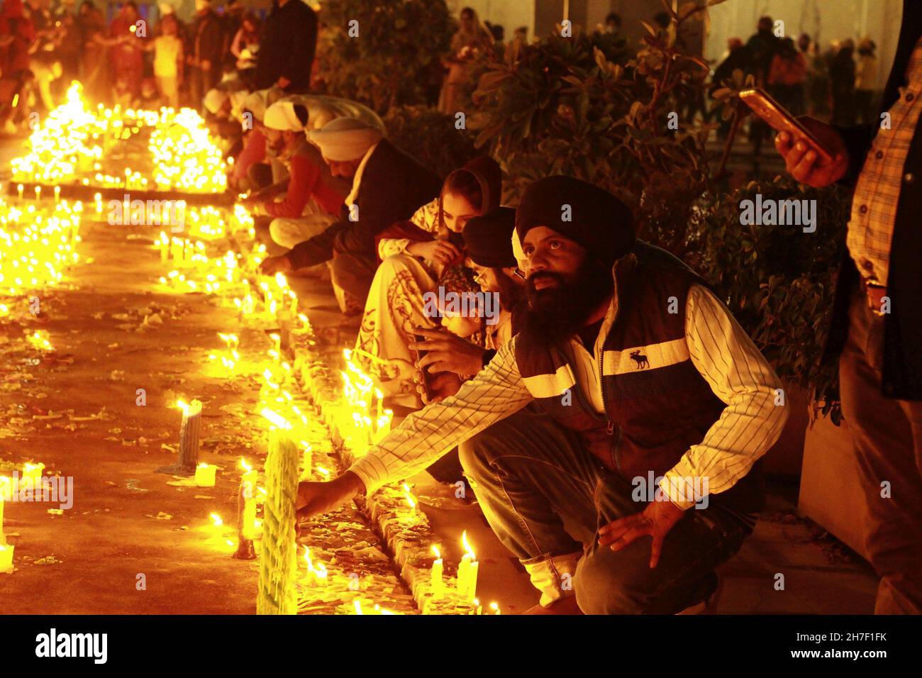 New Delhi, India. 19th Nov, 2021. The candle light ceremony known as ...