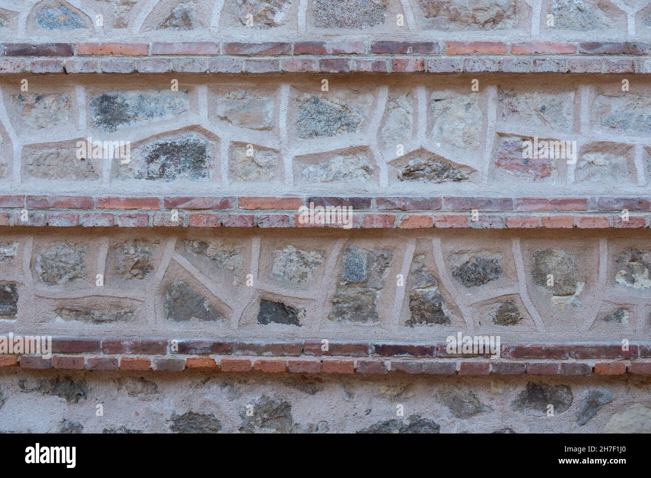 wall background with brick and rustic stone lines Stock Photo - Alamy