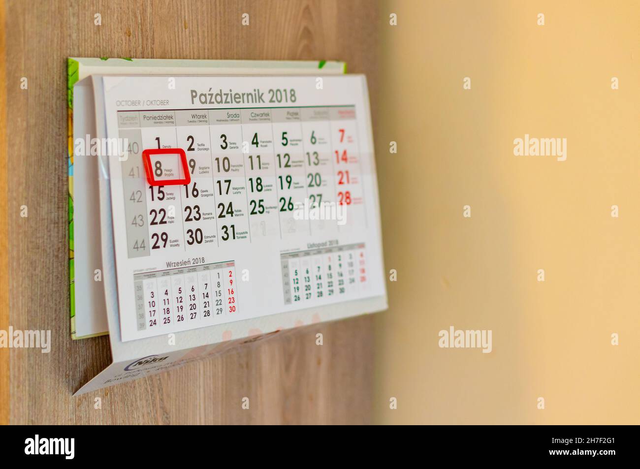 POZNAN, POLAND - Oct 09, 2018: A closeup of a Polish month calendar ...