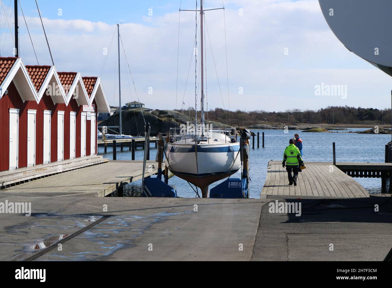 Launching sail boat for the summer season Stock Photo - Alamy