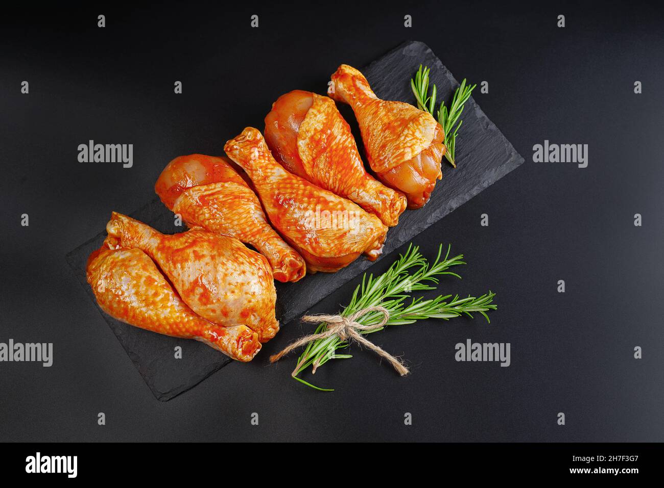 Convenience food, precooked.Raw Marinated chicken meat legs with spices ...