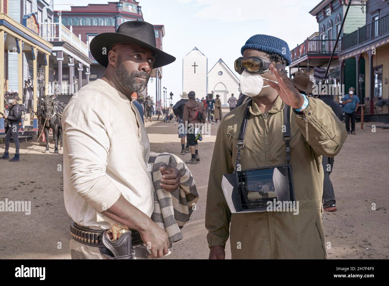 THE HARDER THEY FALL, from left: Idris Elba, director Jeymes Samuel, on ... THE HARDER THEY FALL, from left: Idris Elba, director Jeymes Samuel, on ...