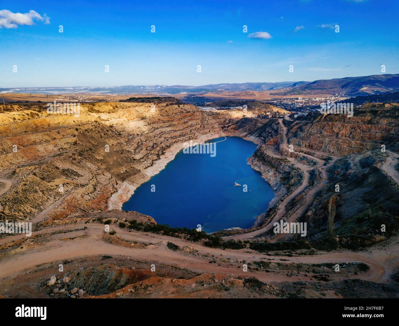 Abandoned limestone quarry with heart shaped lake at the bottom Stock ...