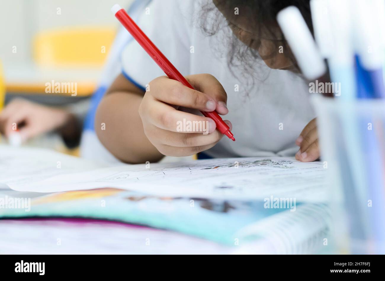 Hands colored pencils drawing hi-res stock photography and images - Alamy
