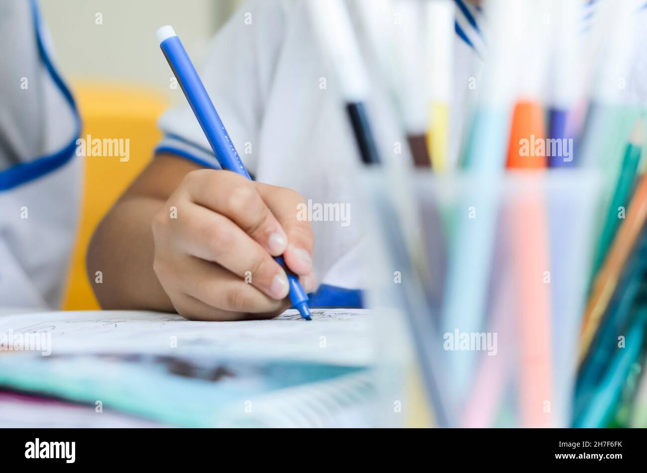 Hands colored pencils drawing hi-res stock photography and images - Alamy