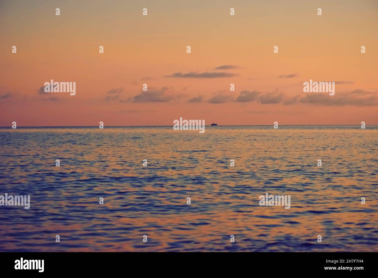 Sunset over the sea surface. Beautiful sky above the horizon Stock ...