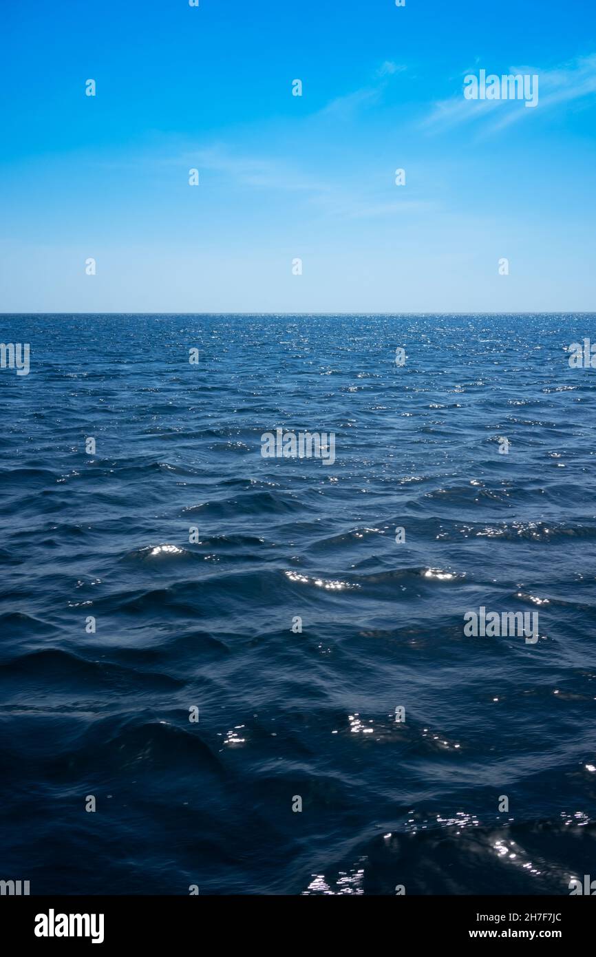 Vertical seascape with water surface Stock Photo - Alamy