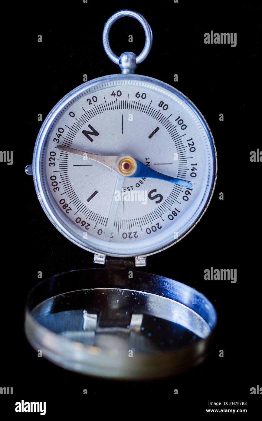 Vertical shot of a compass for measuring and orientation cardinal ...