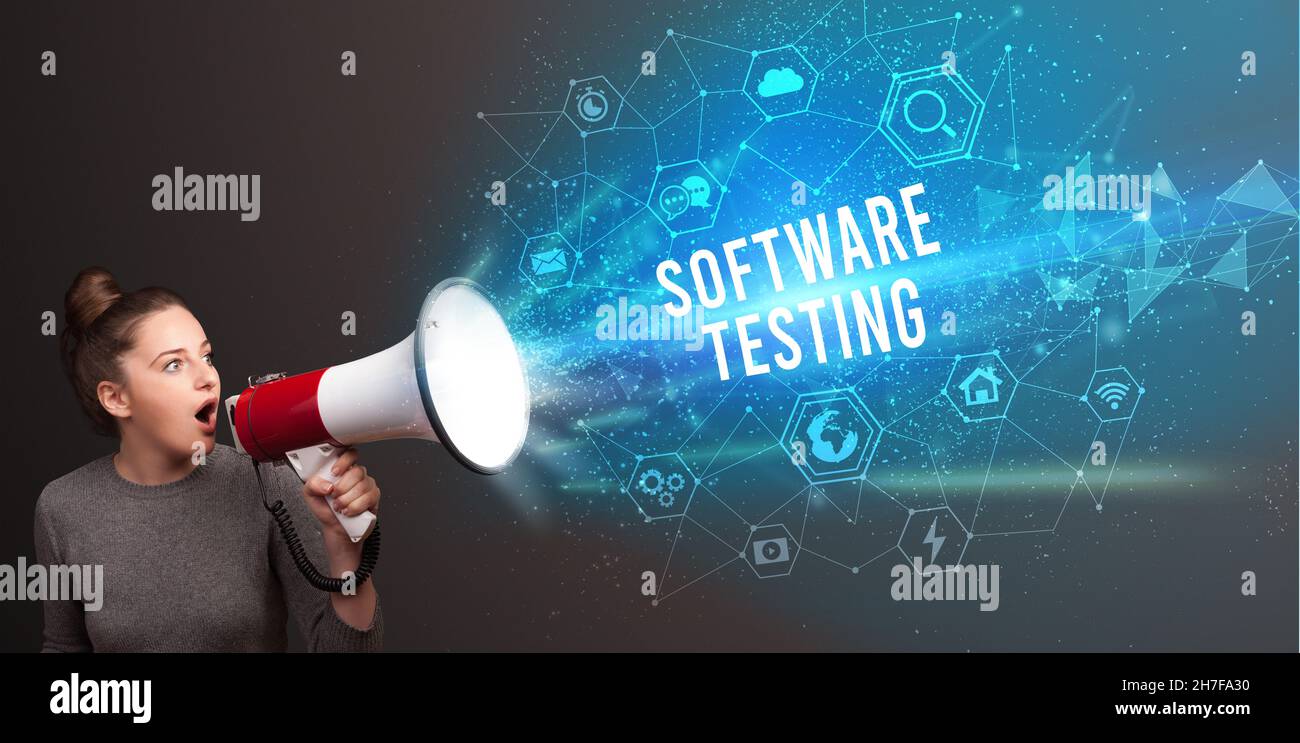 Young woman shouting in megaphone, technology announcement concept ...