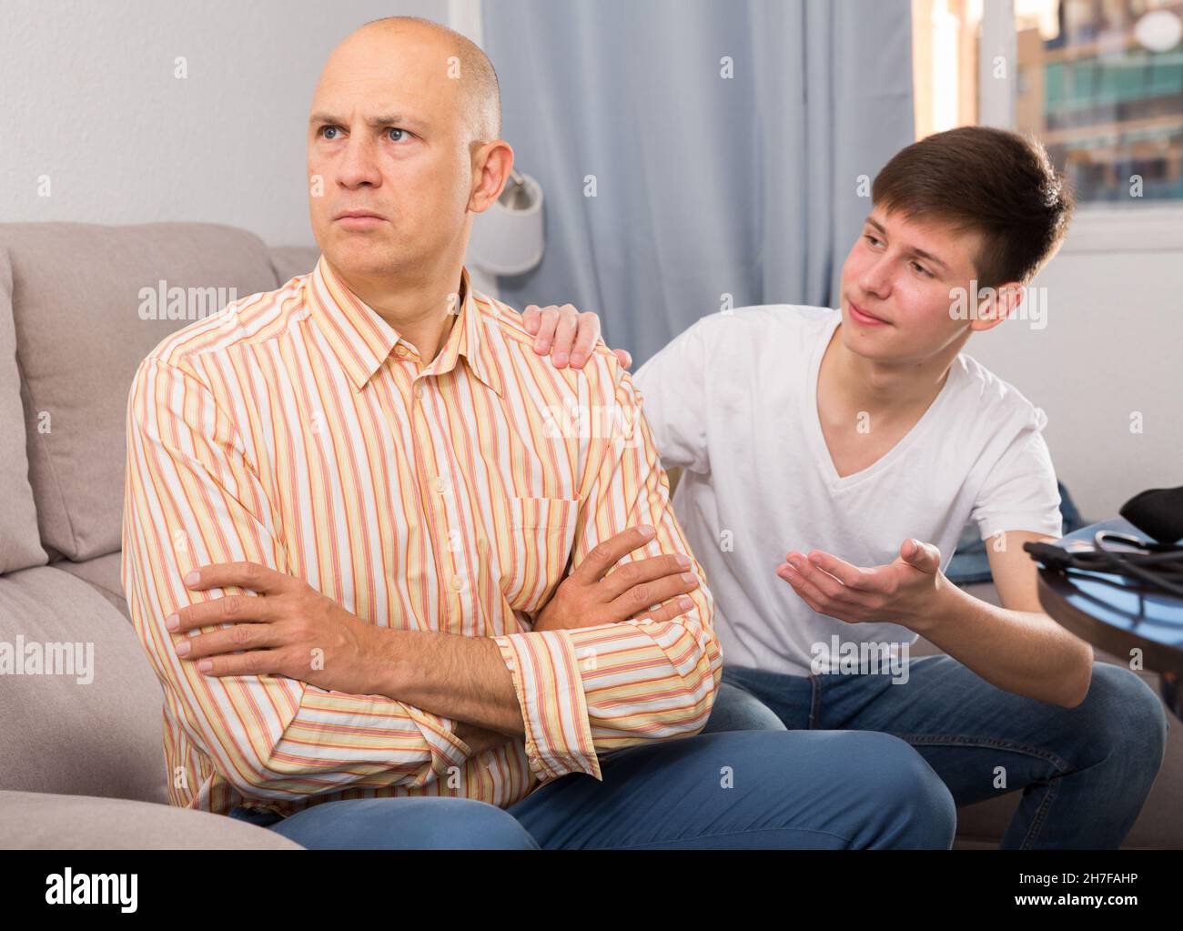 Offended son unhappy father hi-res stock photography and images - Alamy