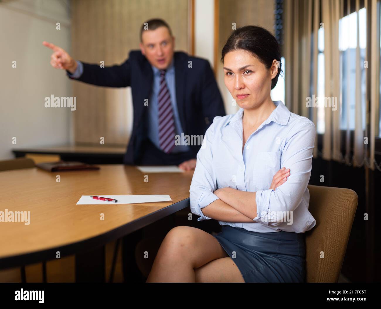 Angry boss firing female colleague hi-res stock photography and images ...