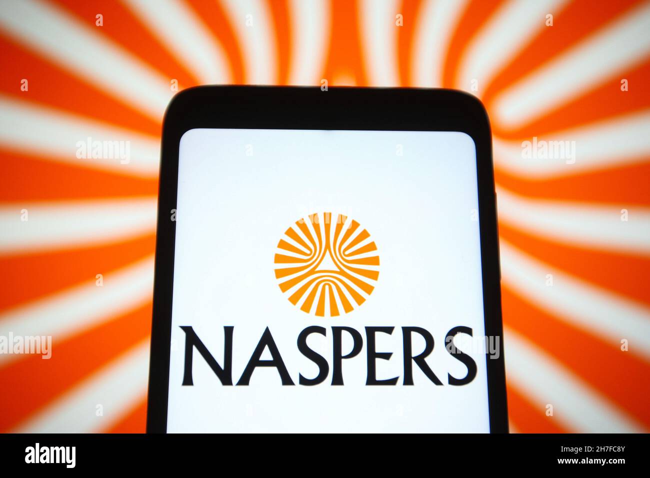In this photo illustration, the Naspers Limited logo is seen on a ...