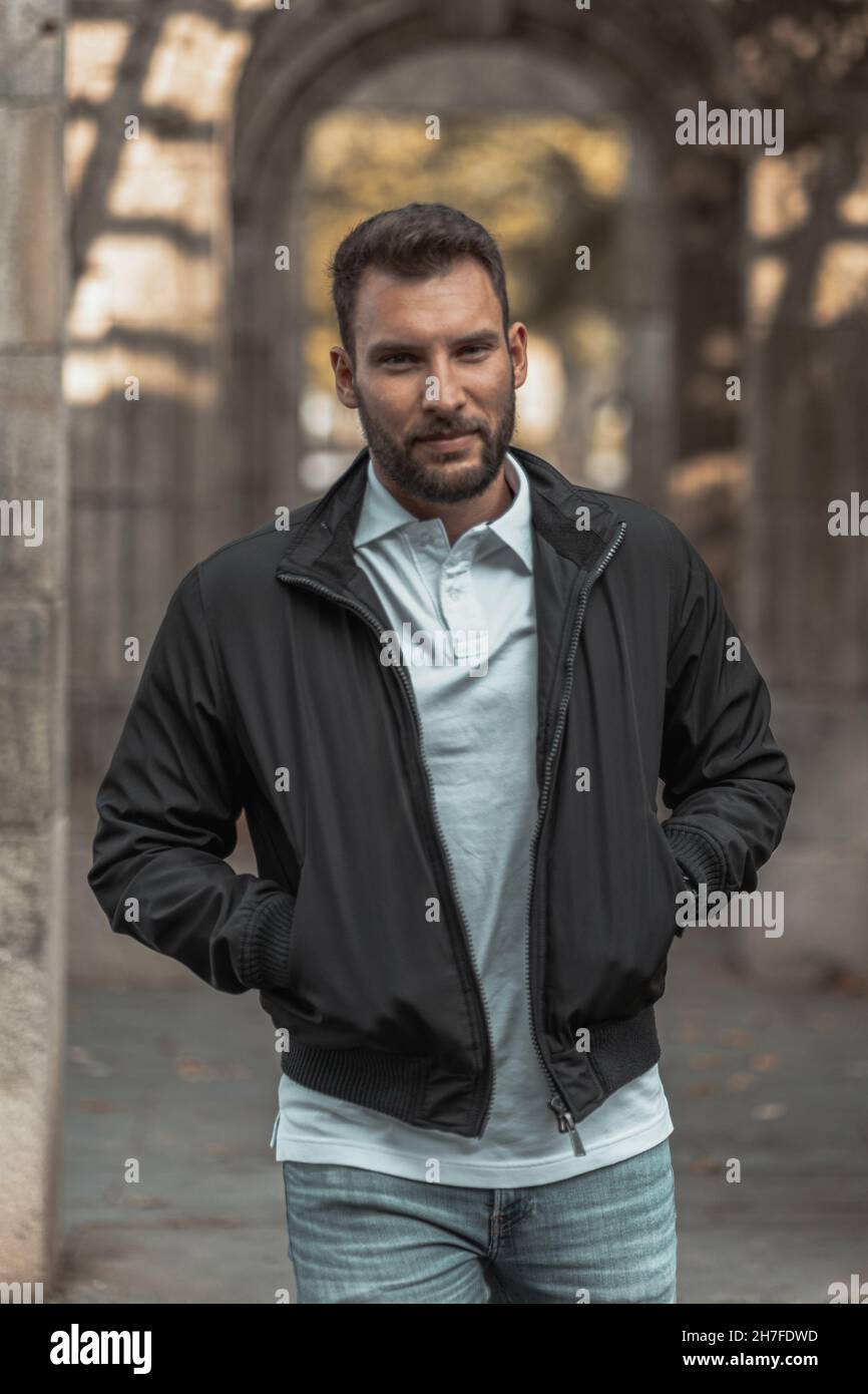 Cool and attractive Slovenian man seriously looking at something Stock ...