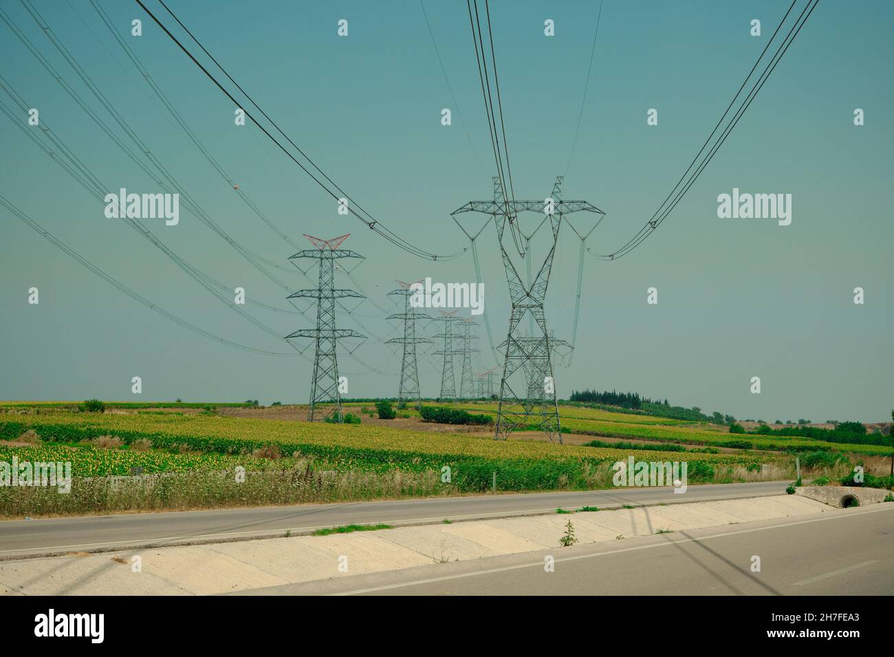 high-voltage transmission line and wires near the aphast road in ...
