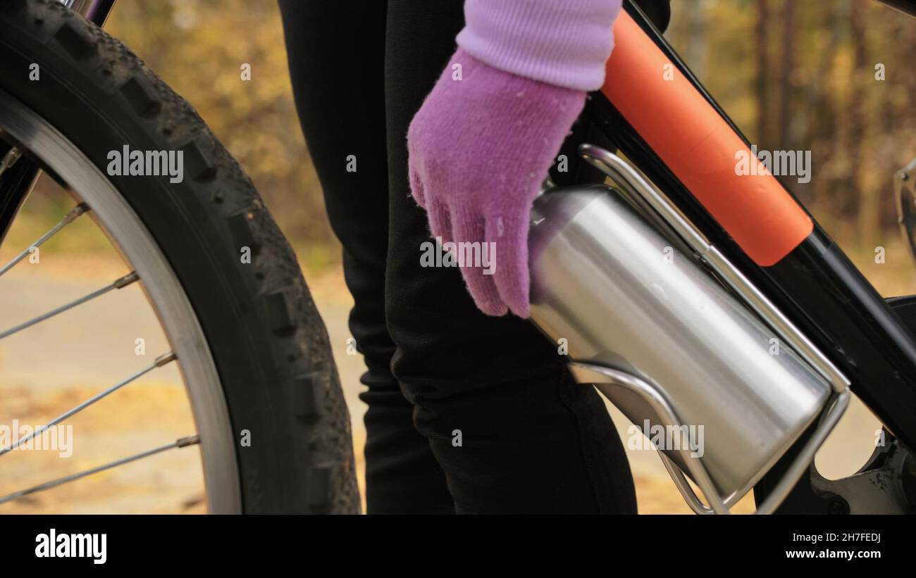 Kid drink water from an aluminum flask bottle. One caucasian children ...