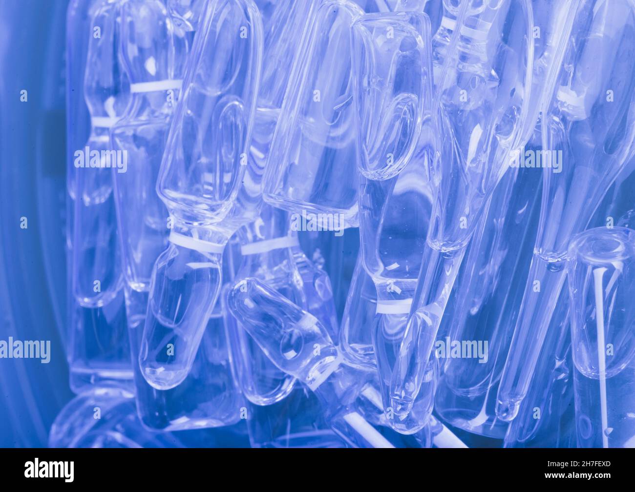 Glass medical ampoule vial for injection. Medicine is liquid sodium ...