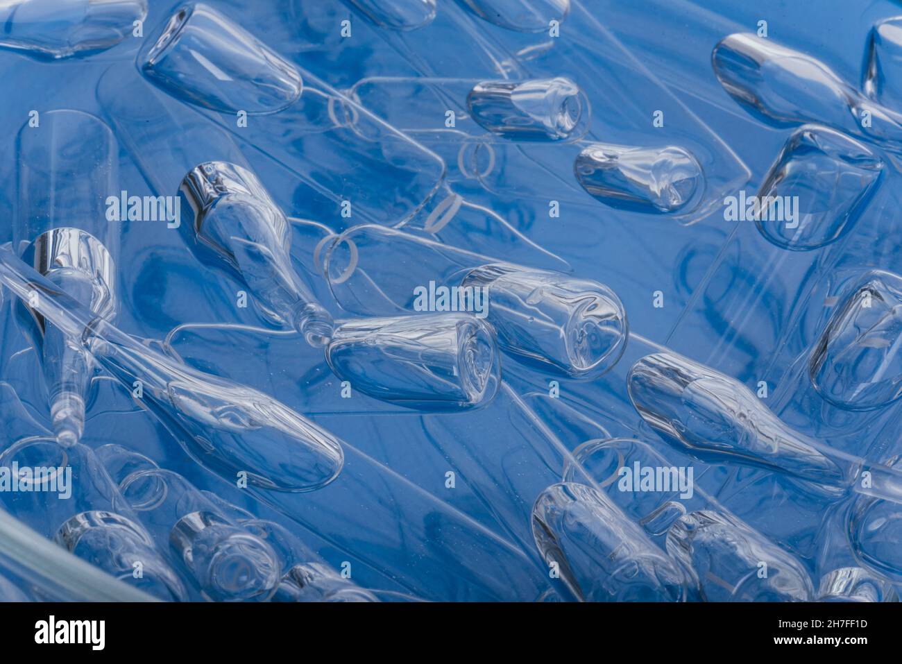 Glass medical ampoule vial for injection. Medicine is liquid sodium ...