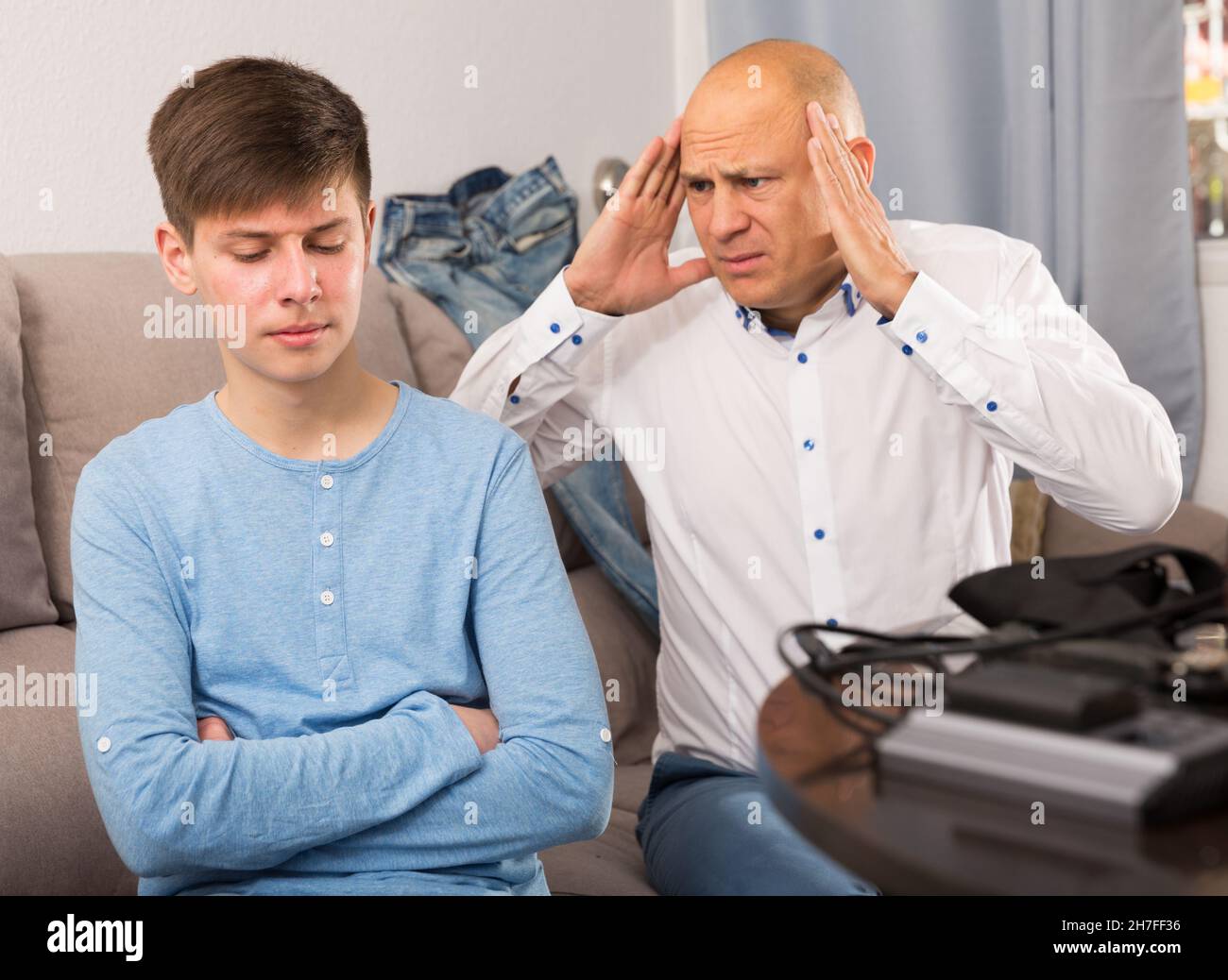 Man scolding son at home Stock Photo - Alamy