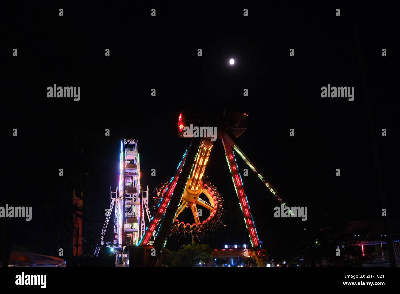 Full moon and play ground at night and ranger and dangerous and excited ...