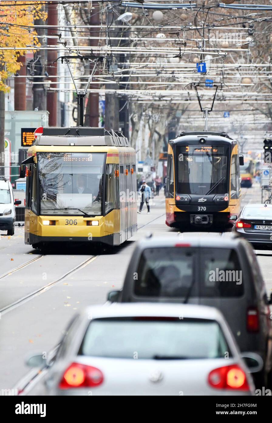 Karlsruhe, Germany. 21st Nov, 2021. Trams drive through the city center ...