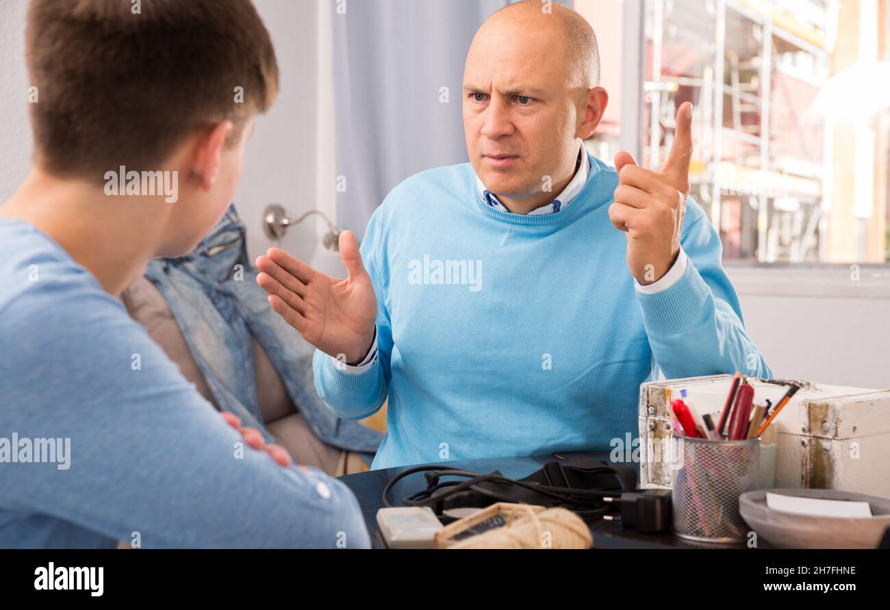 Strict father family hi-res stock photography and images - Alamy