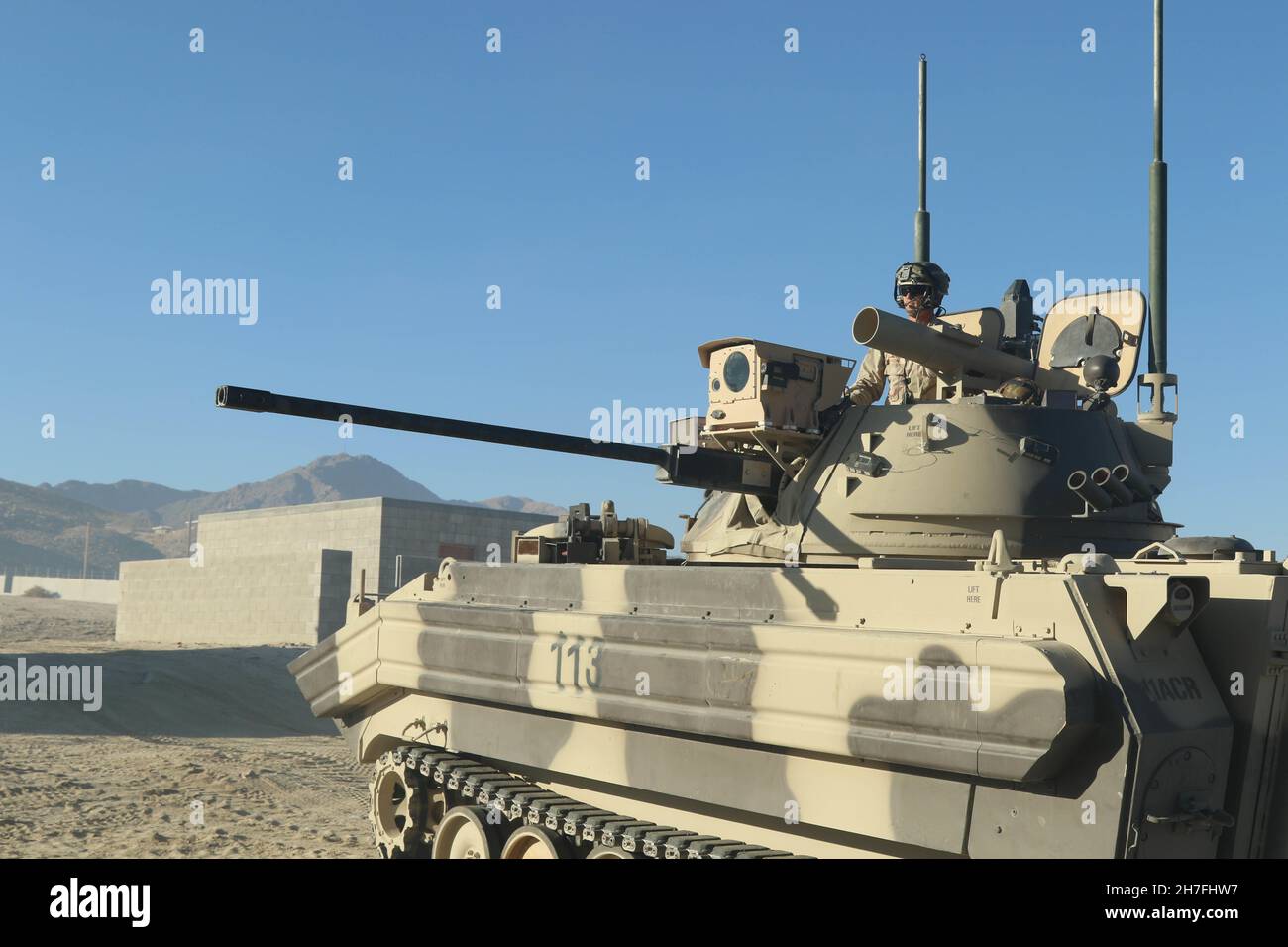 An Opposing Force Surrogate Vehicle carrying Command Sgt. Maj. Todd ...