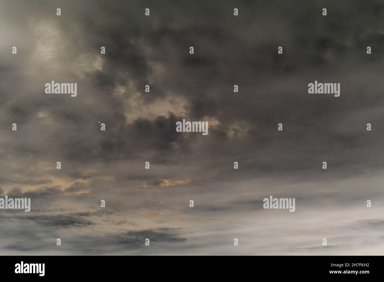 Scenic dark cumulus clouds before a storm Stock Photo - Alamy