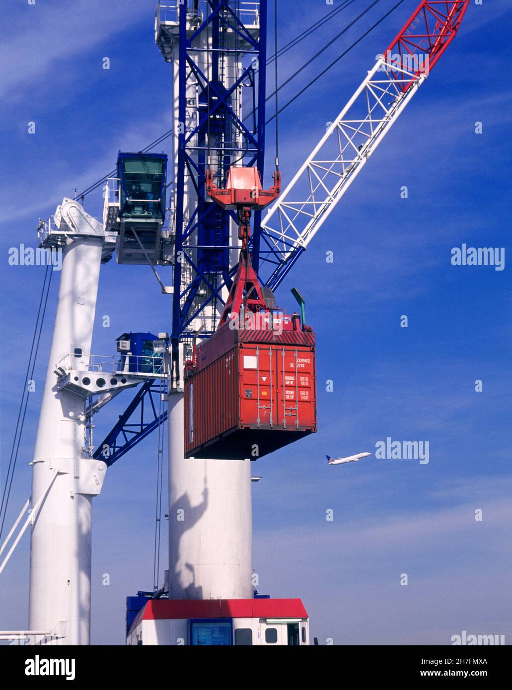 Crane loading cargo container onto hi-res stock photography and images ...