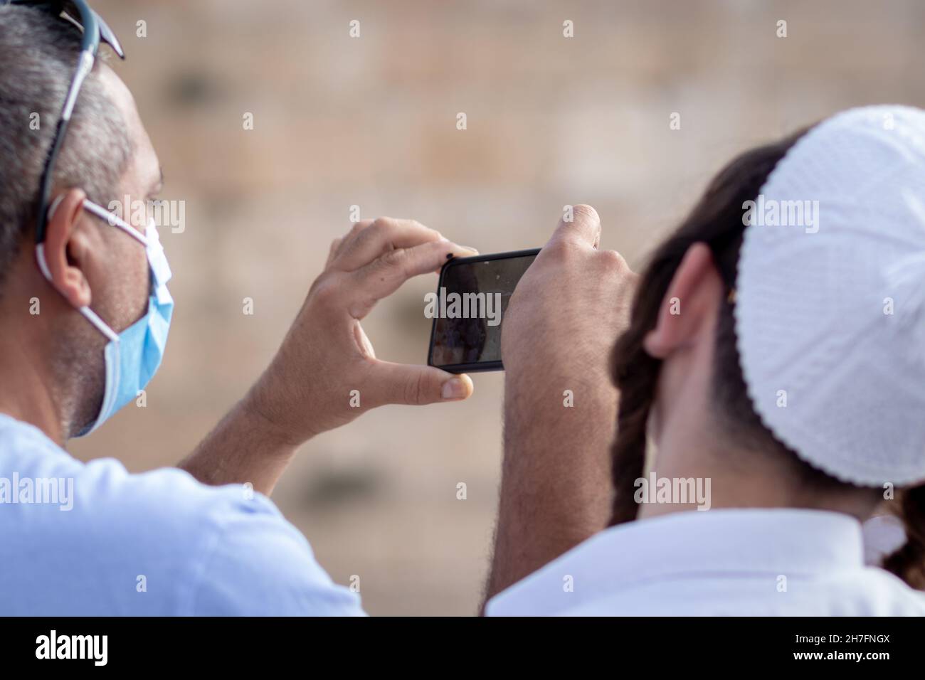jerusalem-israel. 23-09-2021. A man with a blue surgical face mask to ...
