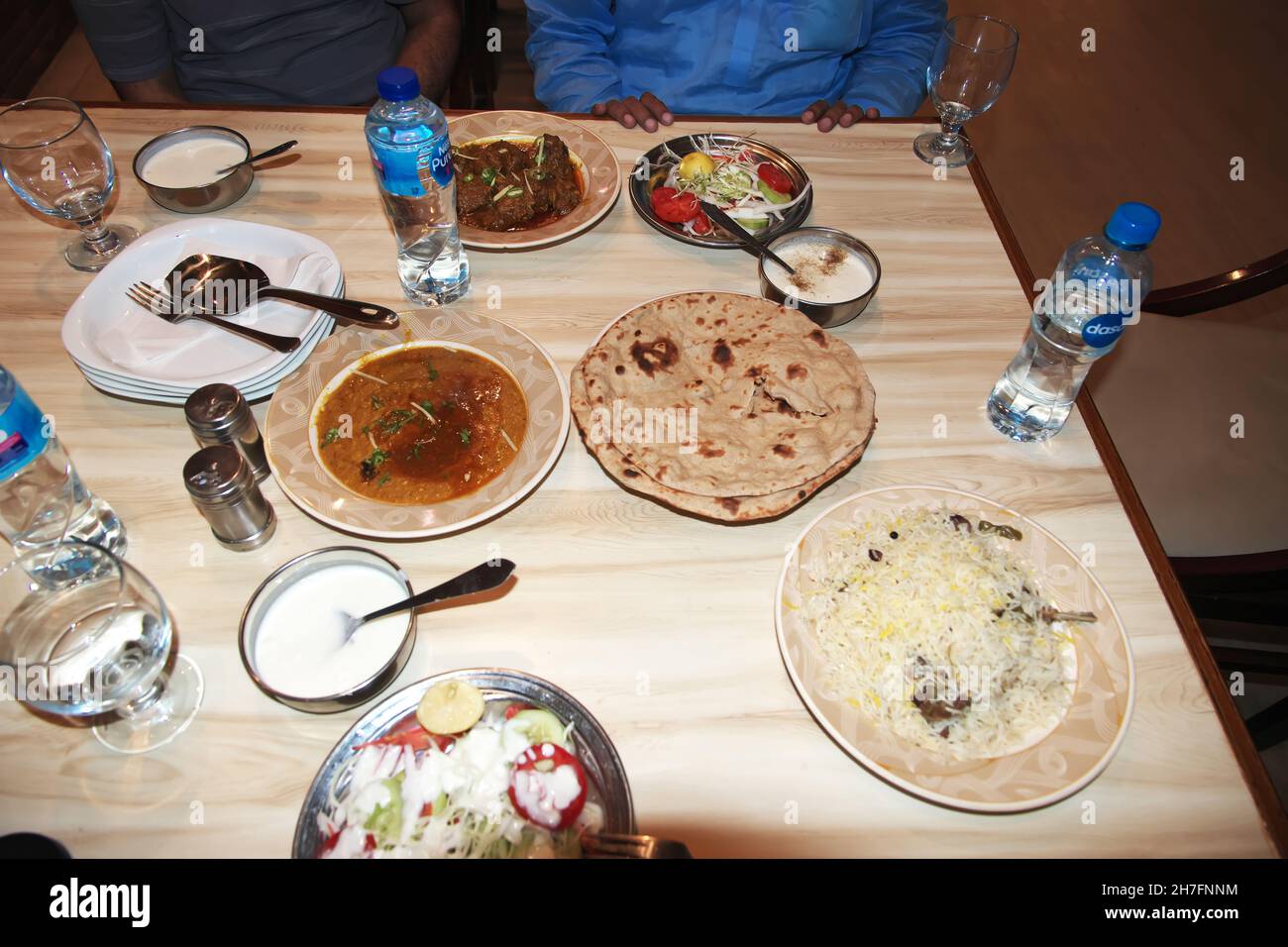 Table with national food in Pakistan Stock Photo - Alamy