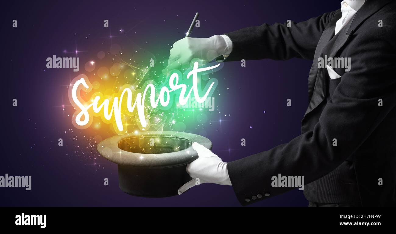Young magician is showing magic trick Stock Photo - Alamy