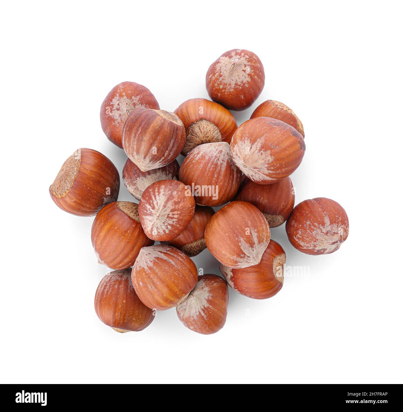 Heap of hazelnuts on white background Stock Photo - Alamy