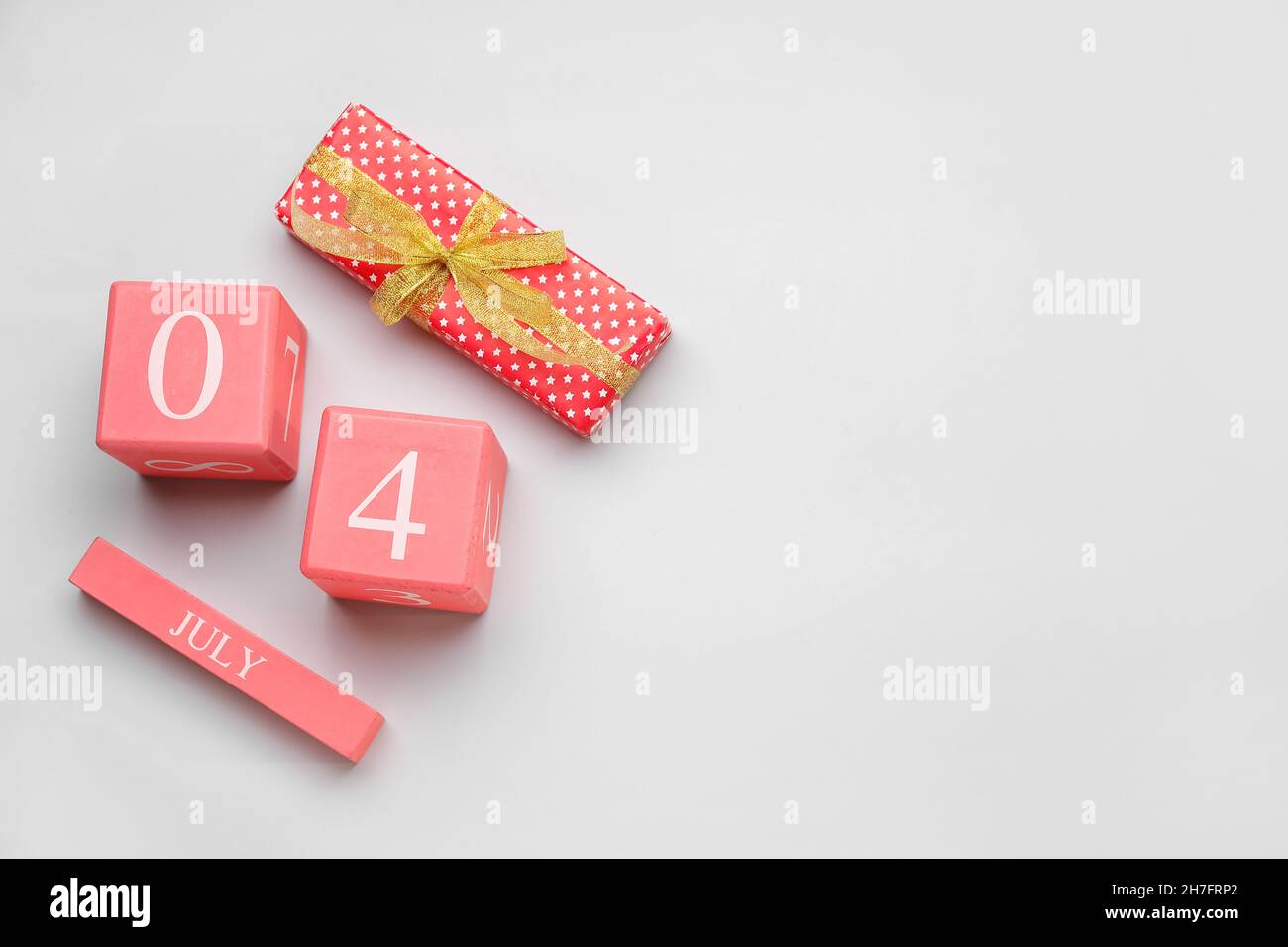 Calendar with date of Independence day and gift box on white background ...