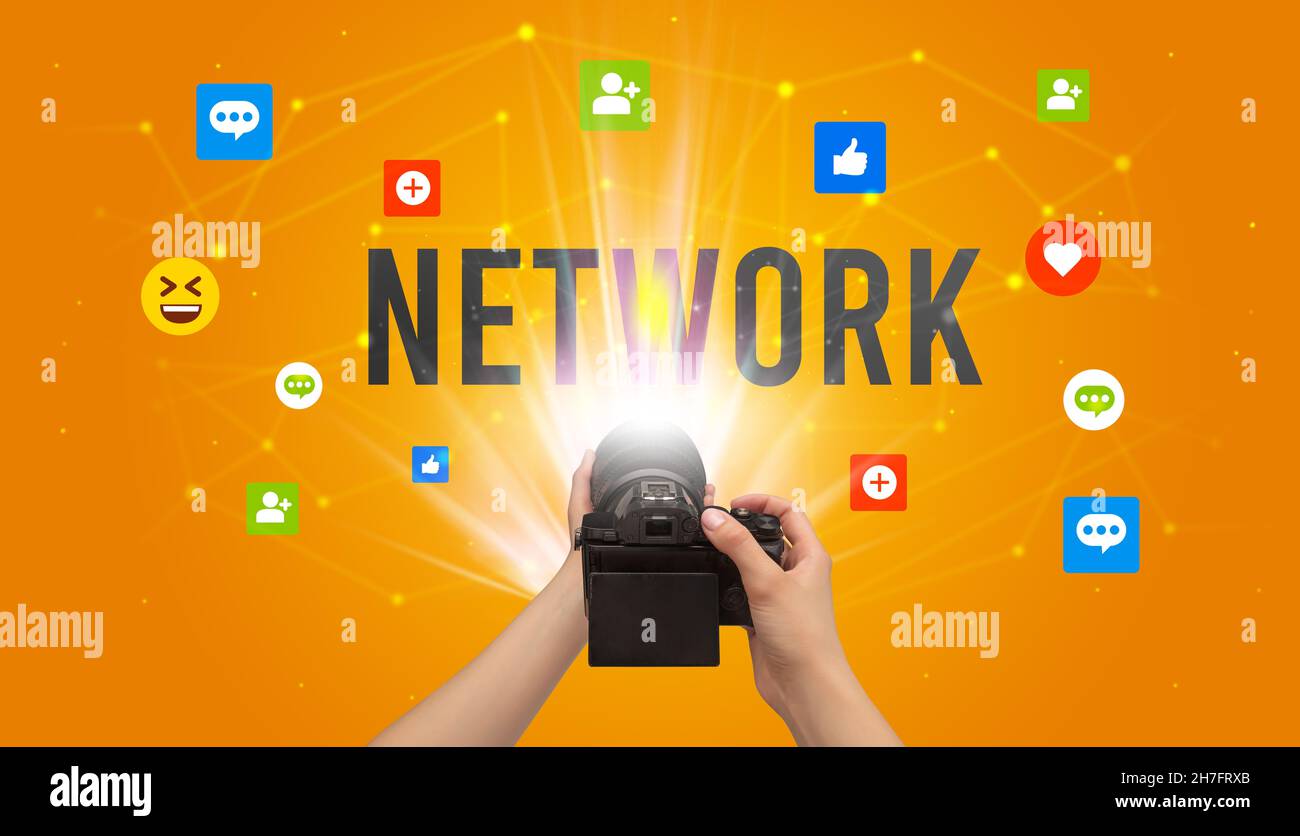 Using camera to capture social media content Stock Photo - Alamy