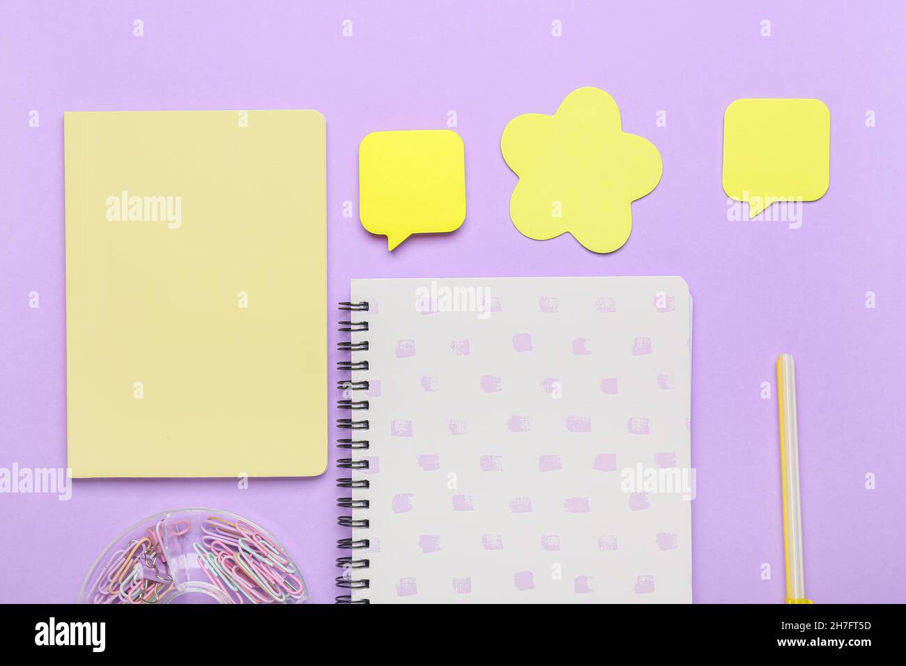 Set of stationery with sticky note papers on lilac background Stock ...