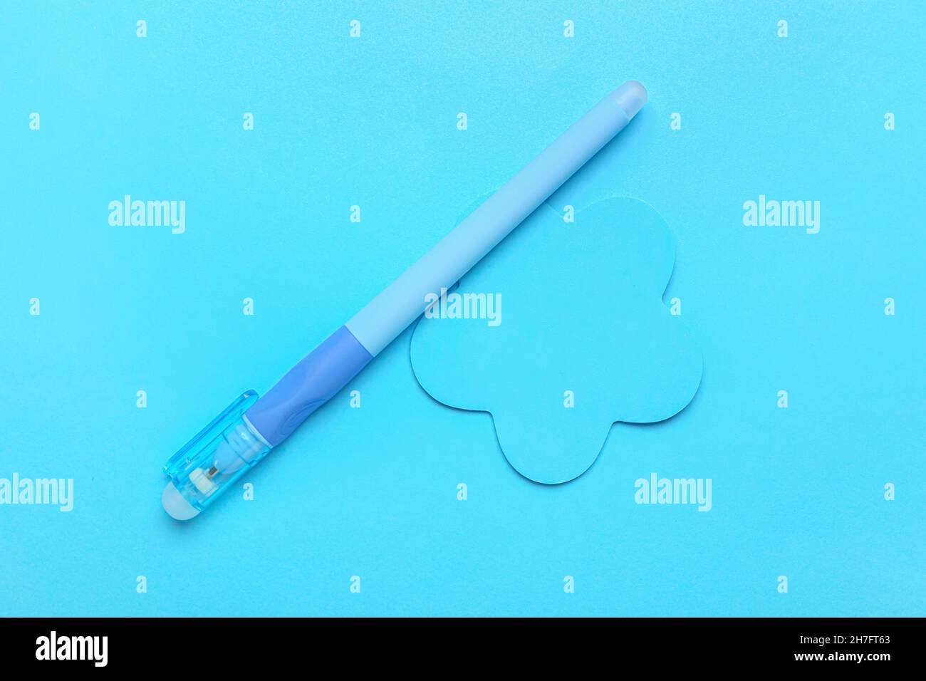 Ball-point pen and sticky notes on color background Stock Photo - Alamy
