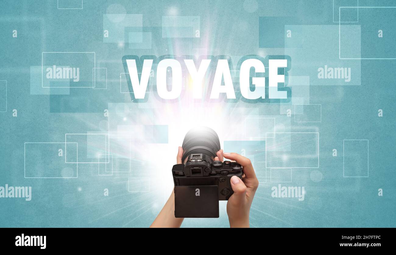 hand holding digital camera, traveling concept Stock Photo - Alamy
