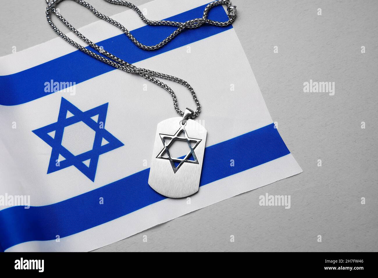 Military tag and flag of Israel on light background Stock Photo - Alamy