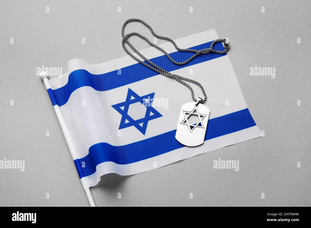 Military tag and flag of Israel on light background Stock Photo - Alamy