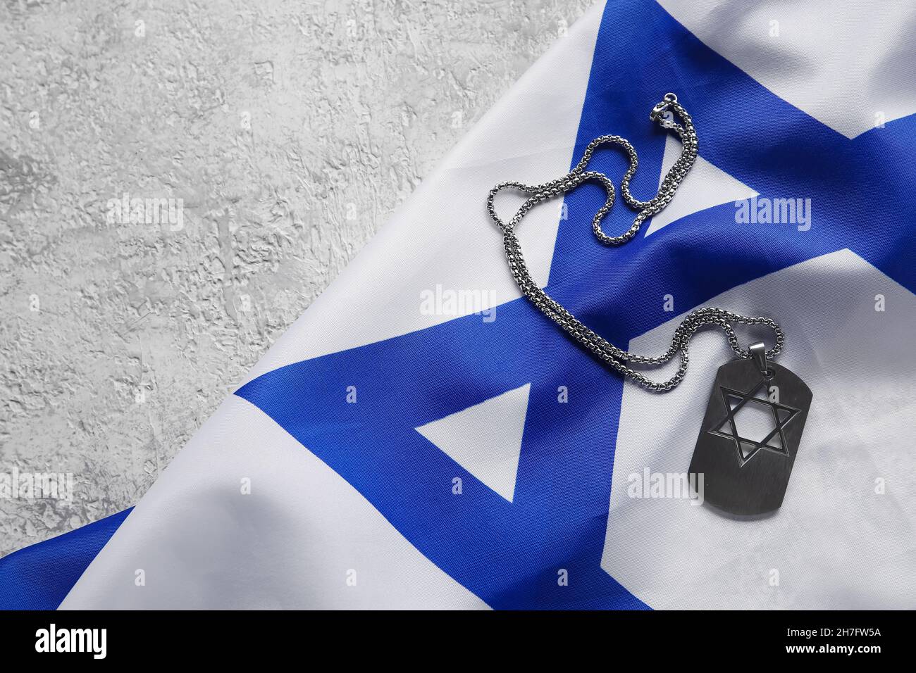 Military tag and flag of Israel on light background Stock Photo - Alamy
