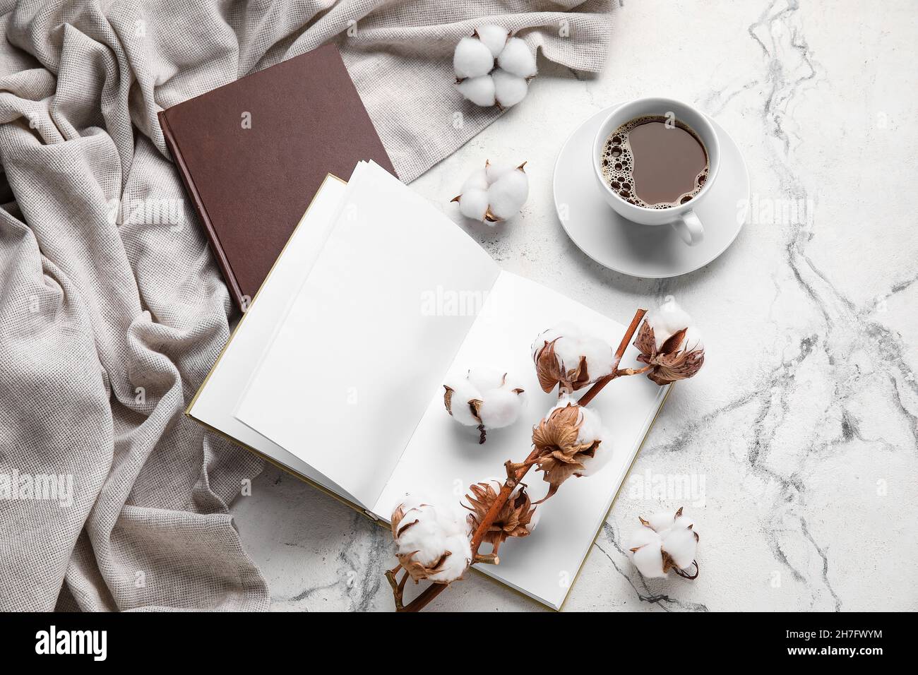 Cup of coffee, opened book with blank pages and beautiful cotton ...